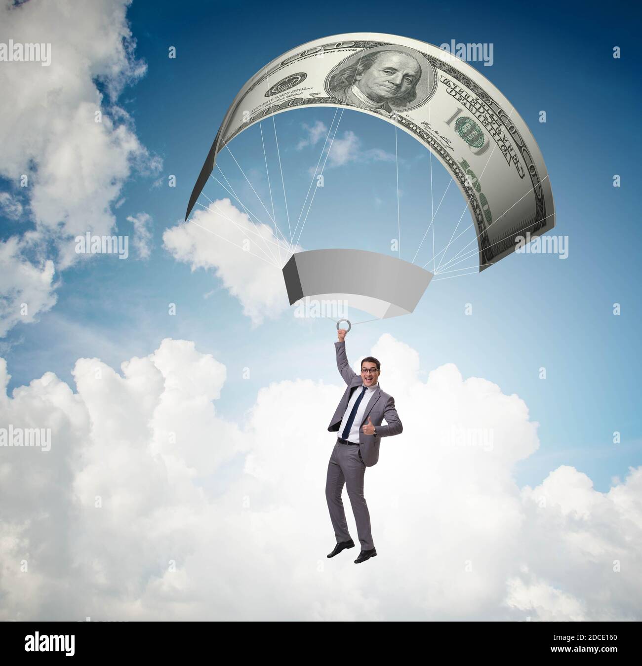 The businessman in golden parachute concept Stock Photo - Alamy