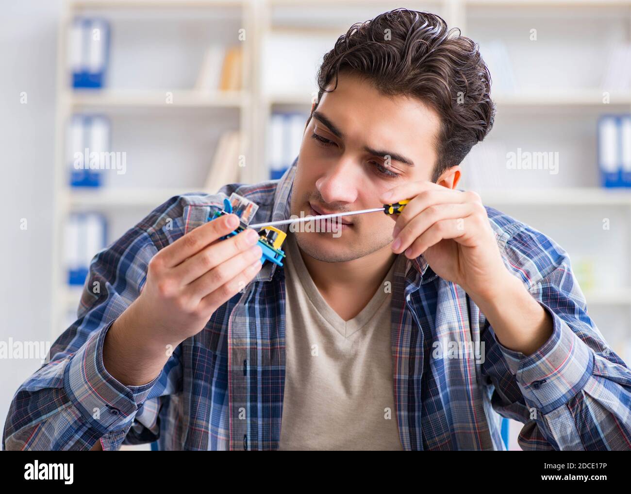 Computer hardware repair and fixing concept by experienced technician ...