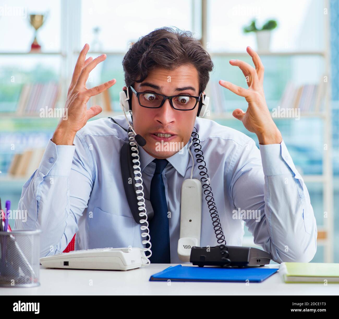 The unhappy angry call center worker frustrated with workload Stock ...