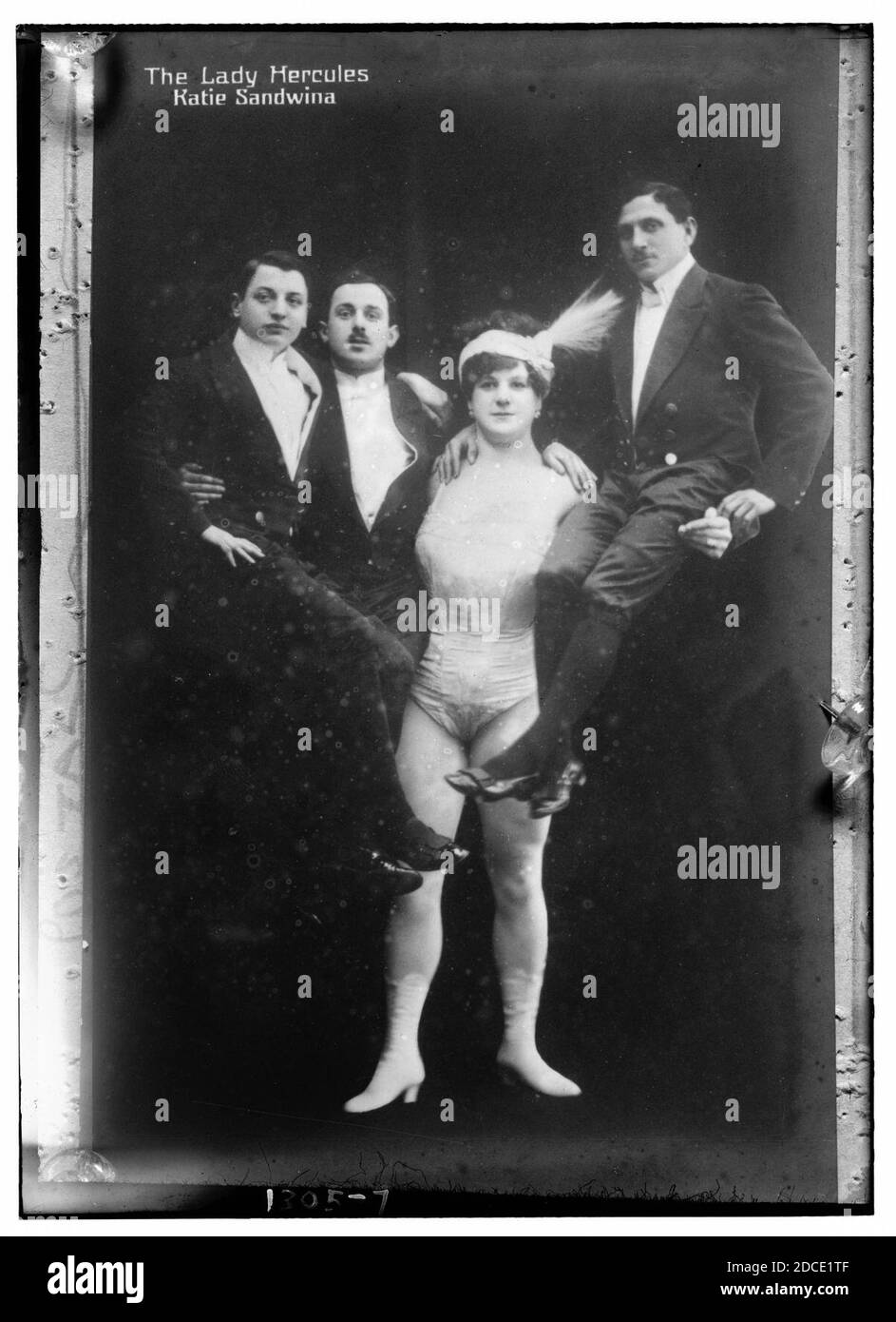 Katie Sandwina, the Lady Hercules (holding up three men Stock Photo - Alamy