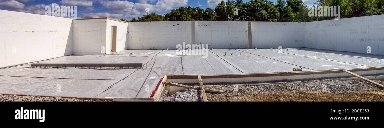 Construction site with planned out stubs, forms, and tools Stock Photo ...