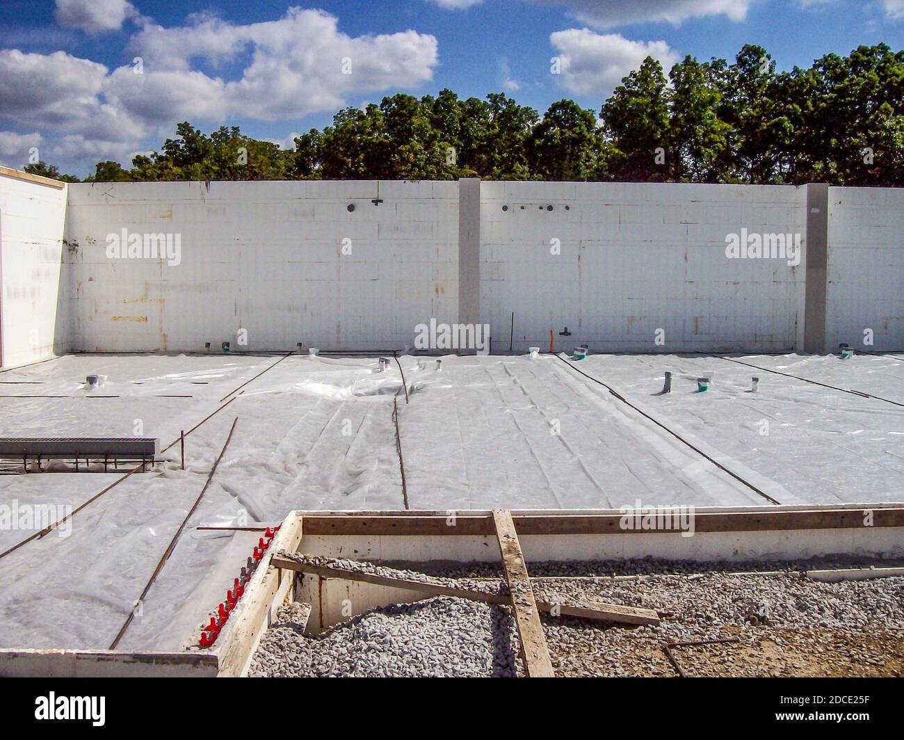 Construction site with planned out stubs, forms, and tools Stock Photo ...