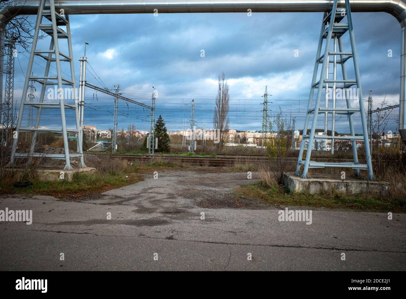 Columns of electrification of the railway line. Tracks in the ...