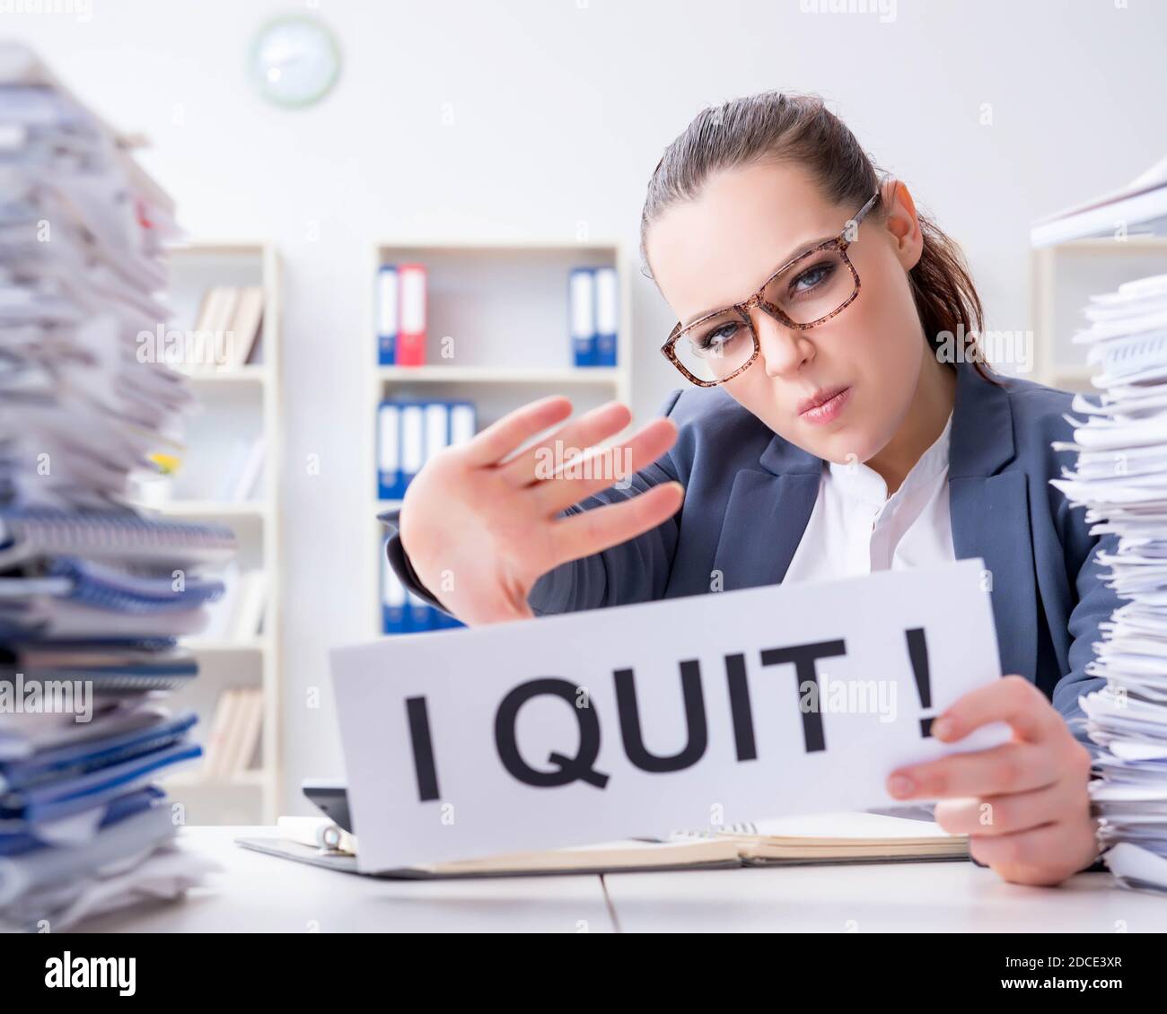 The businesswoman not coping with workload and resigning Stock Photo ...