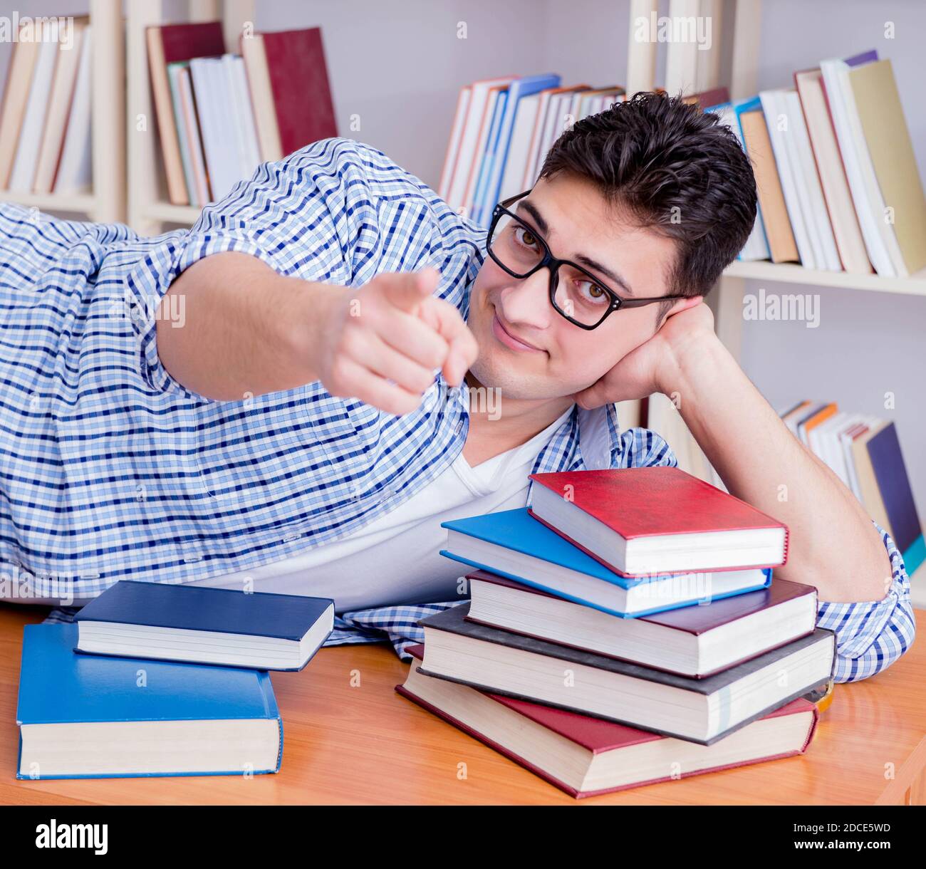 The young student taking break and falling asleep Stock Photo - Alamy