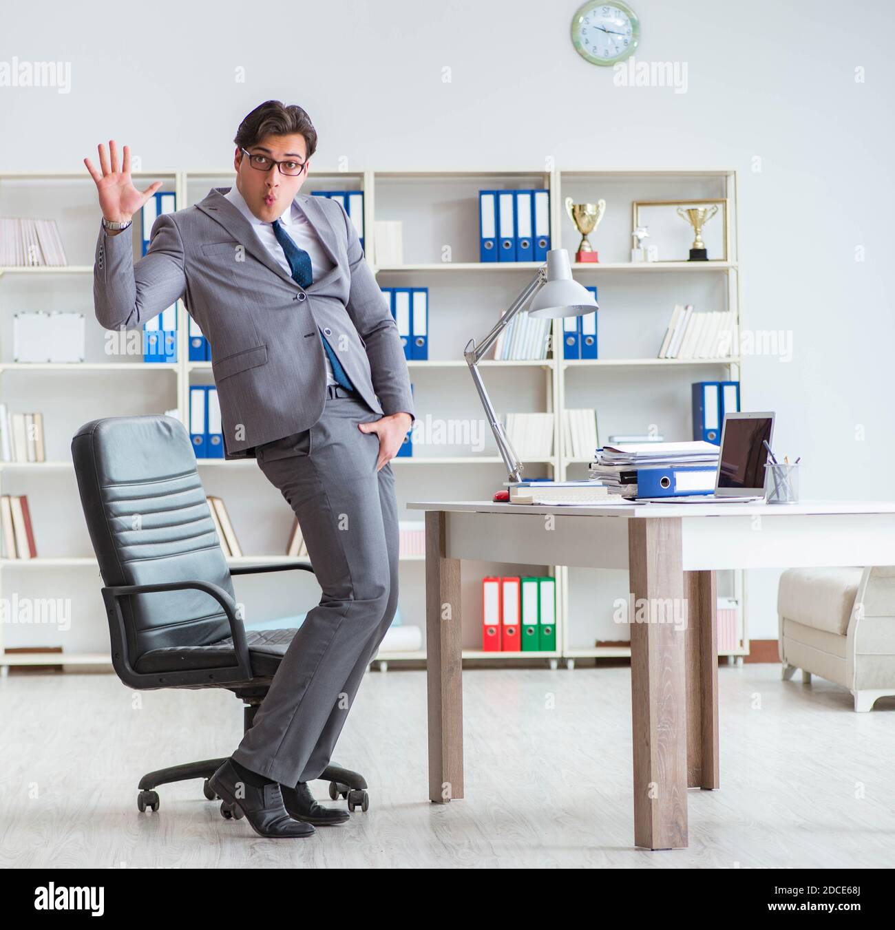 The businessman having fun taking a break in the office at work Stock ...