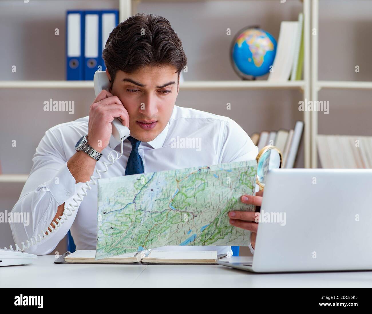 The businessman operator traveling agent working in the office Stock ...