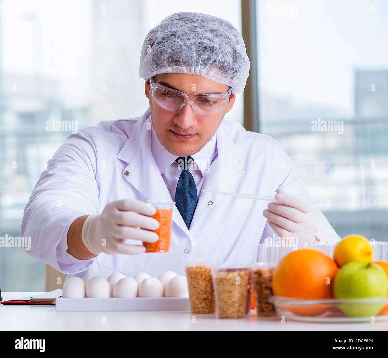 The nutrition expert testing food products in lab Stock Photo - Alamy