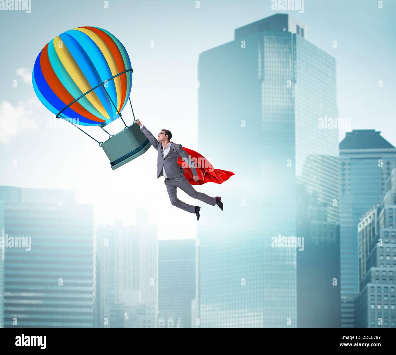 The businessman flying on balloon in challenge concept Stock Photo - Alamy