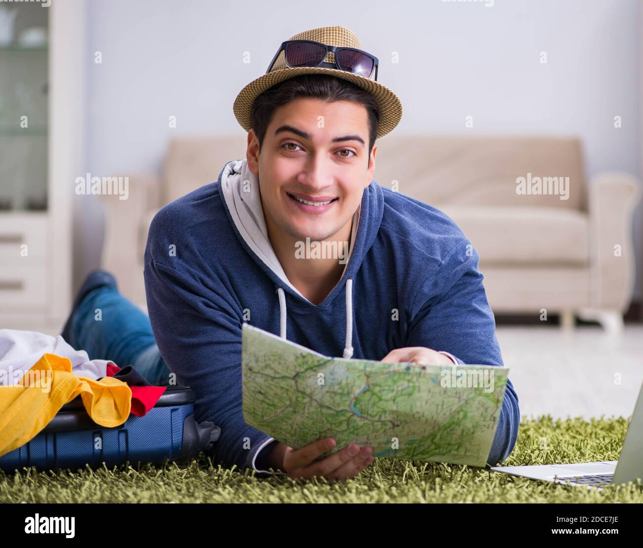 The man planning his vacation trip with map Stock Photo - Alamy