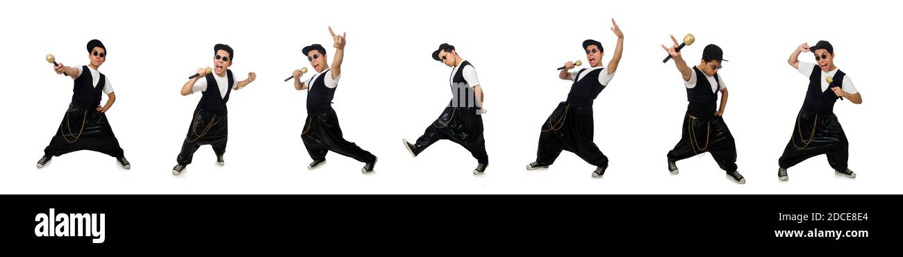 The funny young man dancing isolated on white Stock Photo - Alamy