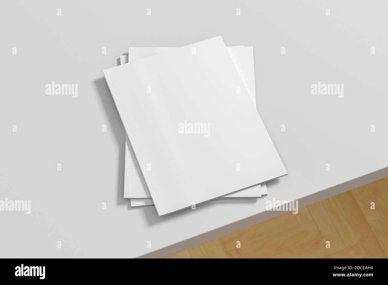 Vertical white magazine or brochure stack mockup on white table. 3d ...