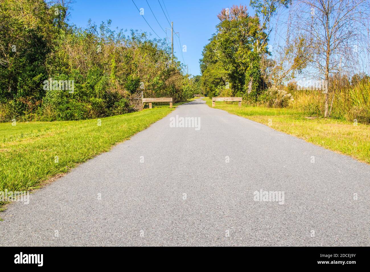 Augusta Canal Trailhead paved walking trail and power lines Stock Photo ...