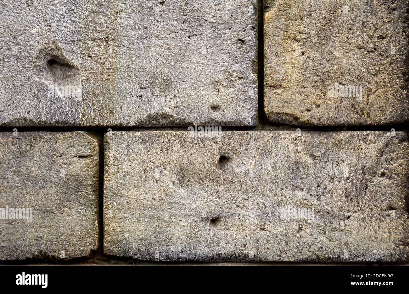 A fragment of a masonry wall made of large blocks Stock Photo - Alamy