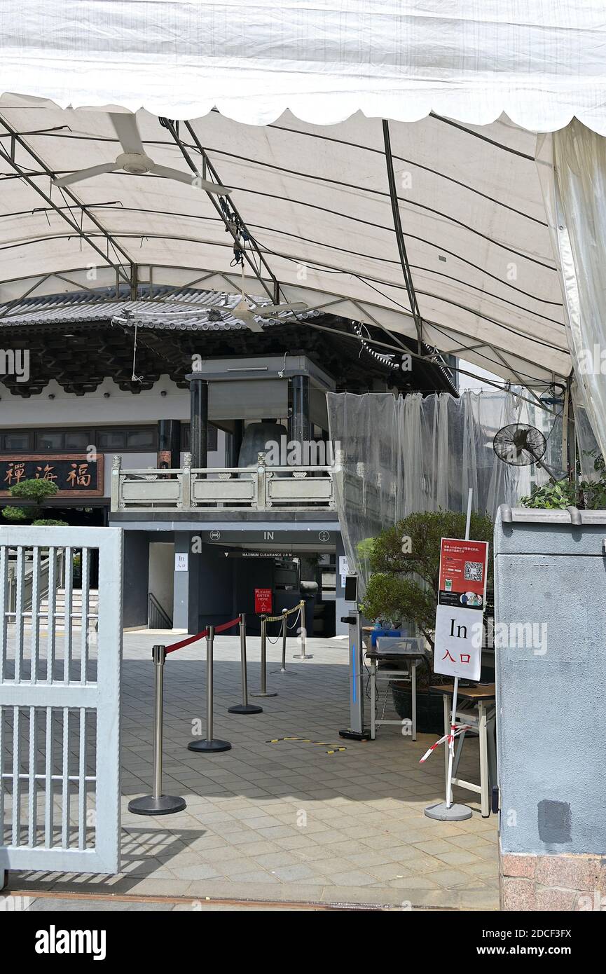 Singapore - Nov 6, 2020:Temperature monitoring and QR code scanning at ...