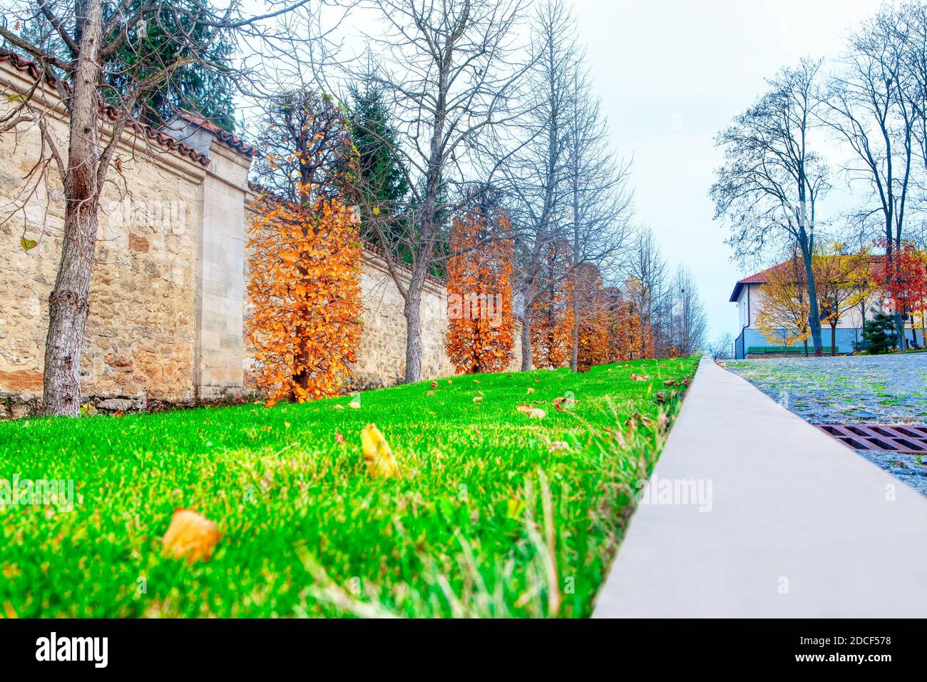Park Walking Path along Medieval Wall . Autumn Promenade Stock Photo ...
