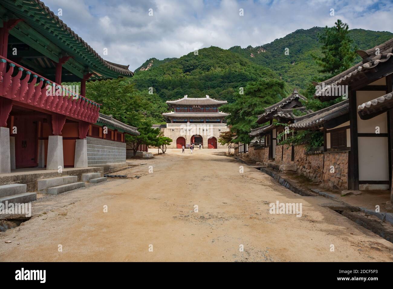 Landscape of Korean traditional buildings, trees, mountains, stones ...