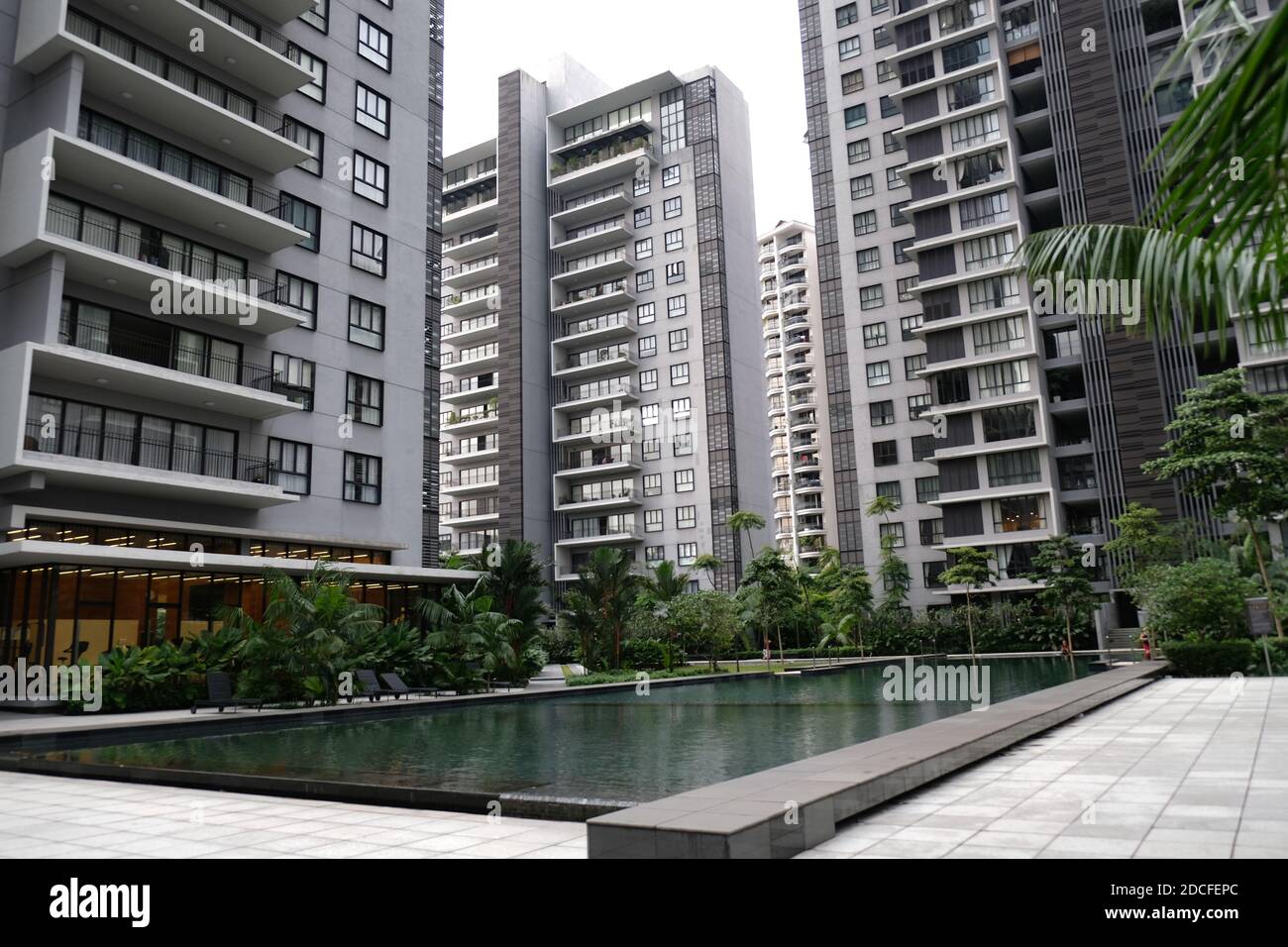 White residential building green trees hi-res stock photography and ...
