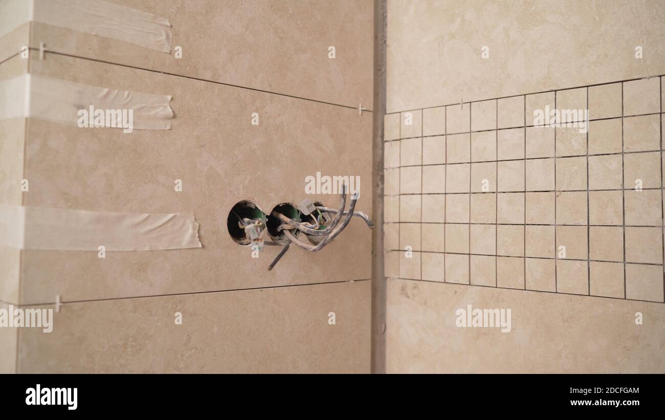 Large new tiles in the bathroom. Fresh tiles in the bathroom ...