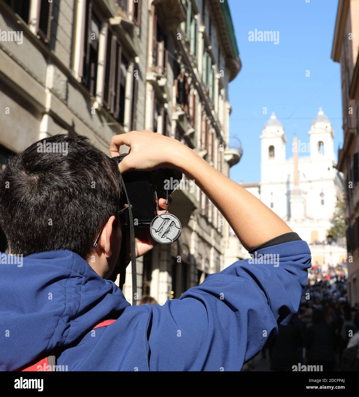 young photographer taking photos in the Italian city of Rome Stock ...