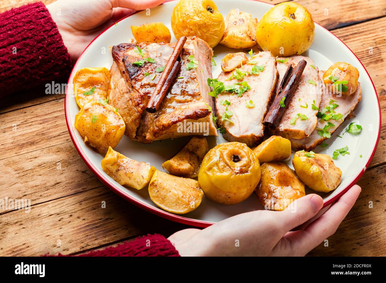 Pork loin stew with apple.Baked meat with apples Stock Photo - Alamy