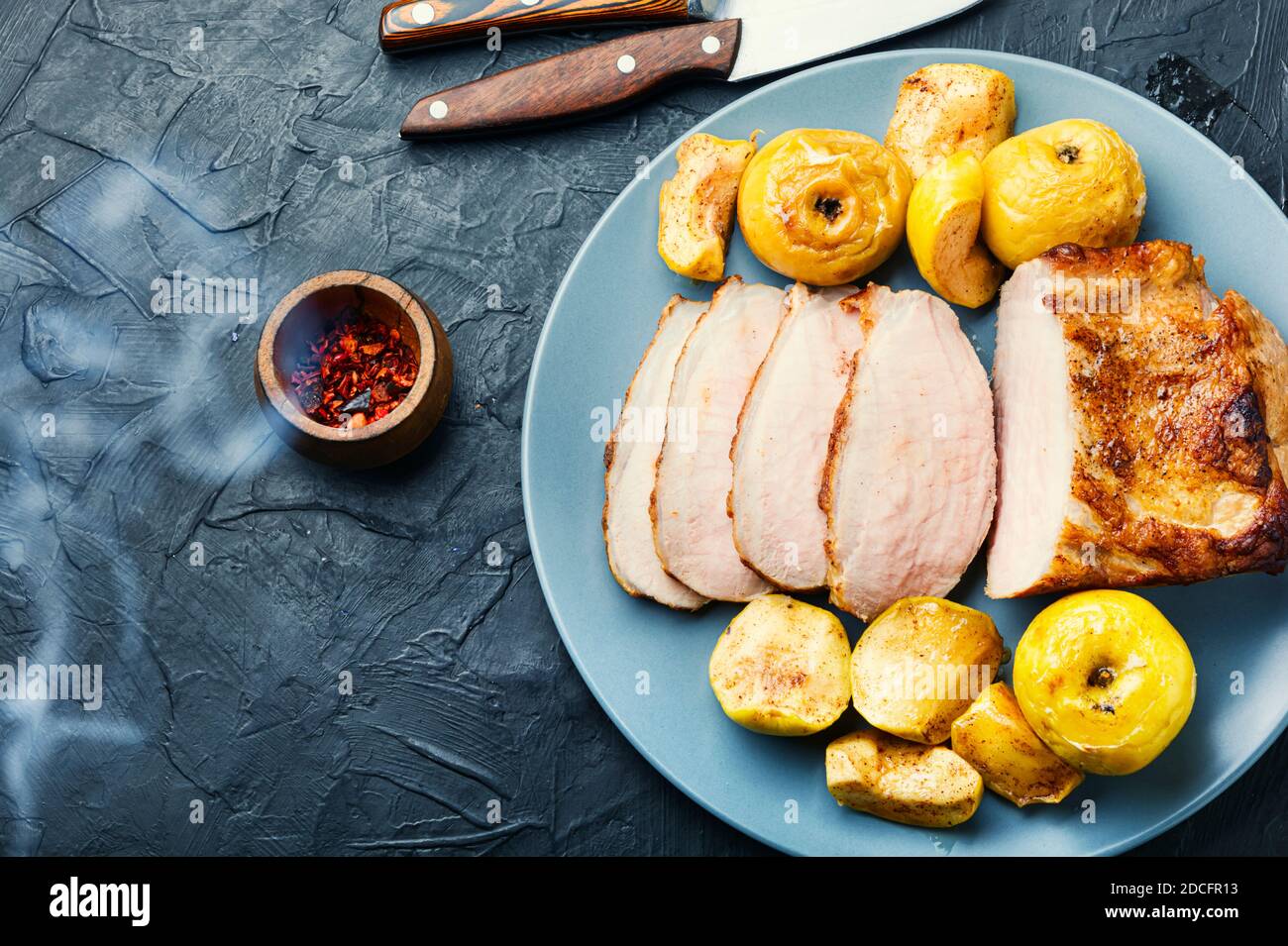 Pork loin stew with apple.Baked meat with apples Stock Photo - Alamy