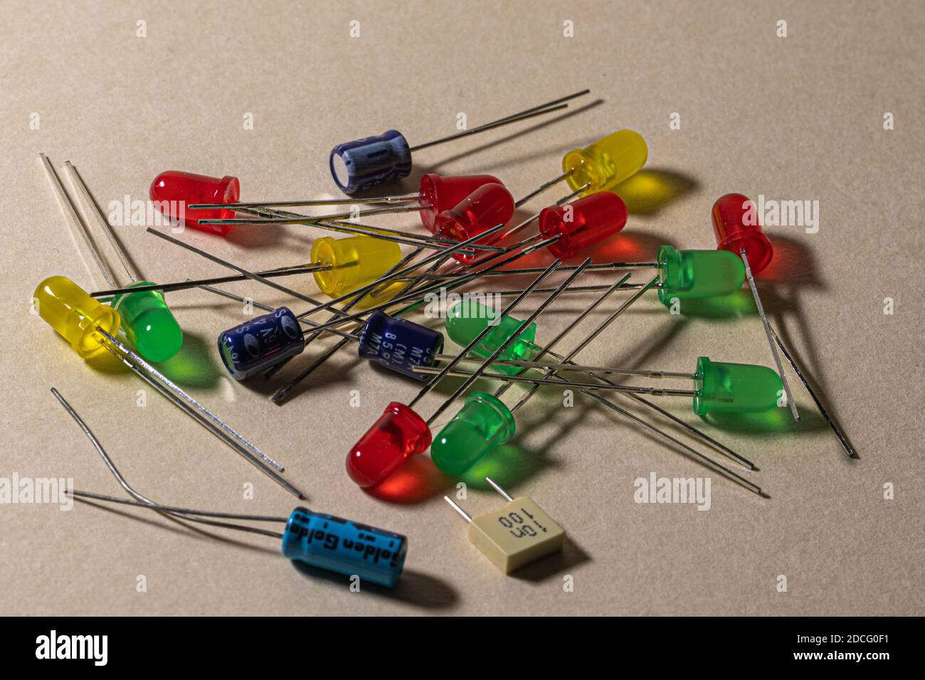 electronic components scattered on clear background Stock Photo - Alamy