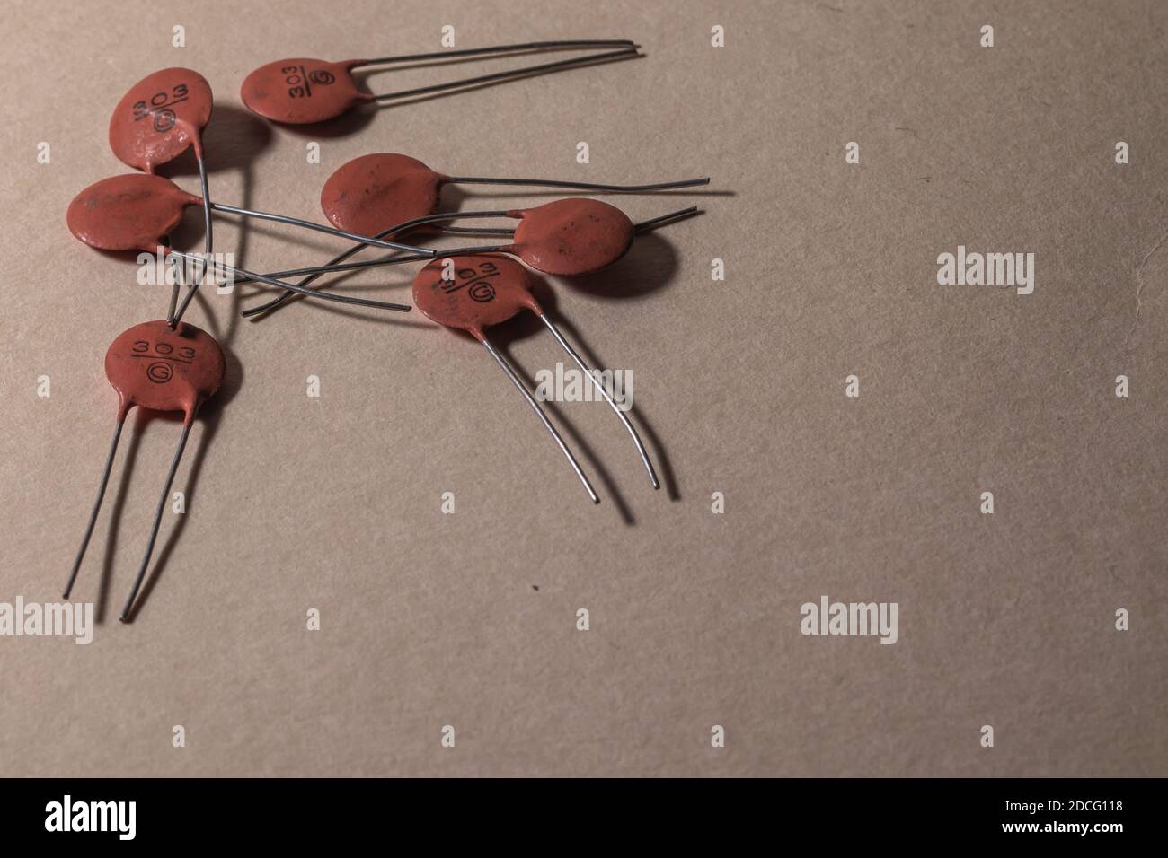 electronic components scattered on clear background Stock Photo - Alamy