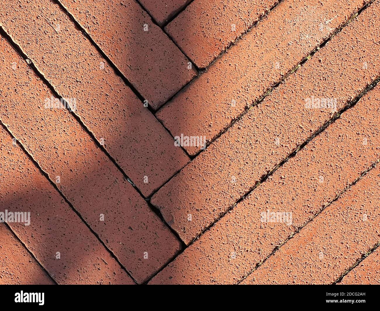 diagonal red brick path detail Stock Photo - Alamy