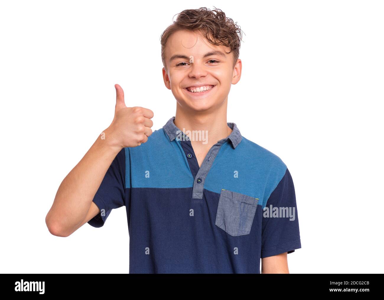 Cute teen boy pointing up, gesturing idea or doing number one gesture ...