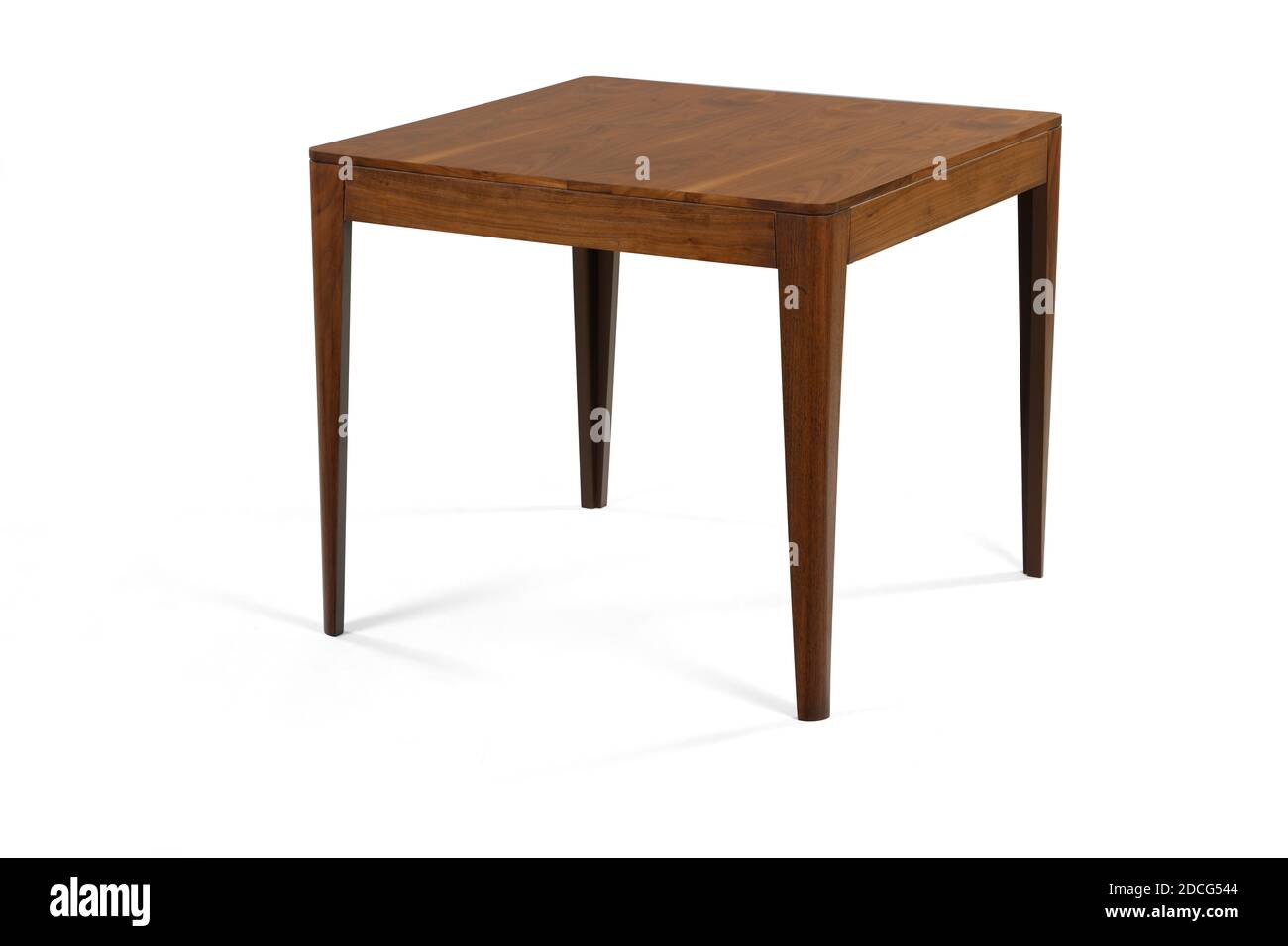 Single dining table on white background Stock Photo - Alamy