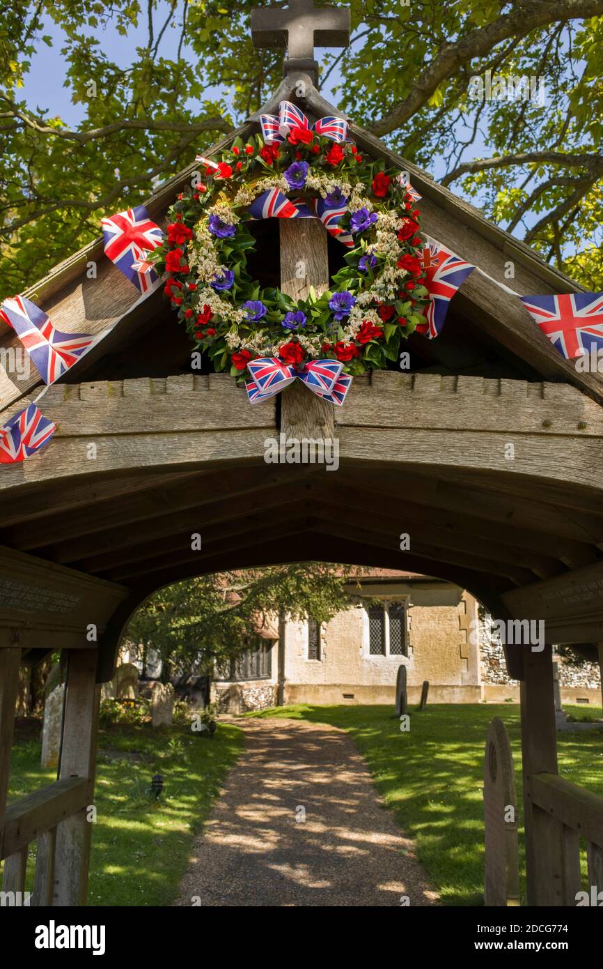 Lych gate decorated for VE Day 2020 at the Holy Cross Church in Hoath ...