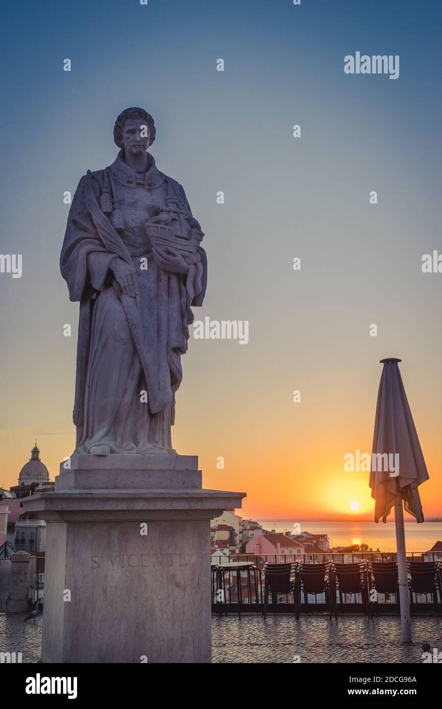 A statue of St. Vincent in Largo Porta da Sol holding the symbols of ...