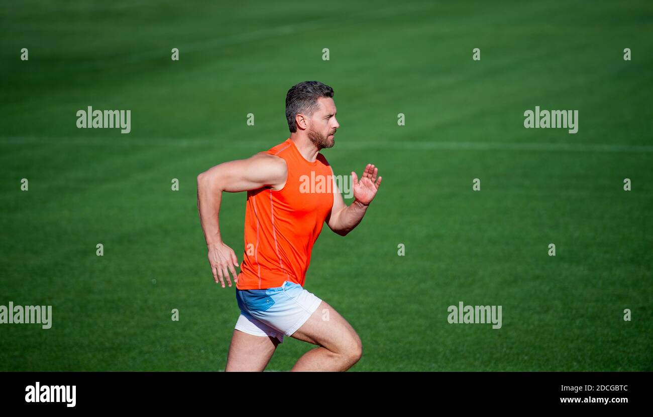 Athlete running fast track coach hi-res stock photography and images ...