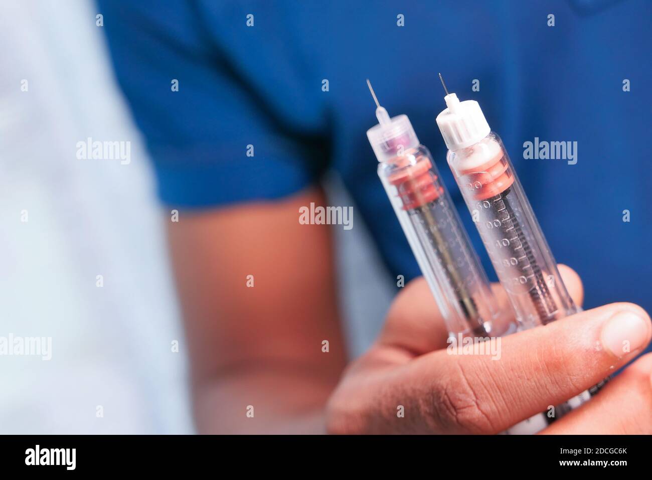 hand holding Insulin pens with copy space, Top down Stock Photo - Alamy