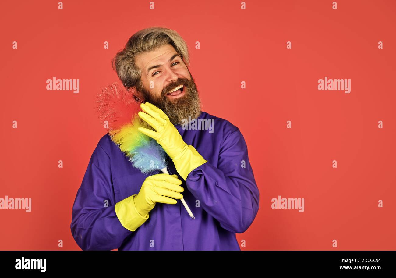 Dust allergy. Polypropylene duster. Hipster holding cleaning tool ...
