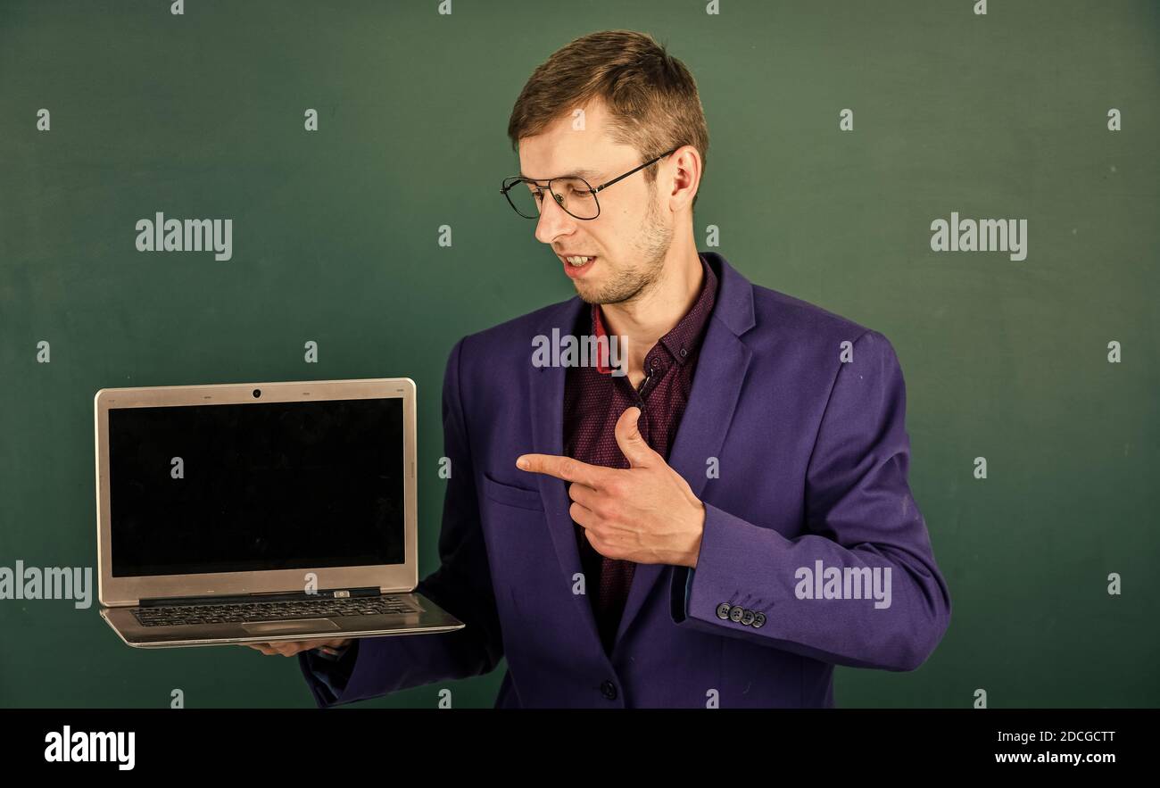 School teacher using modern laptop for education screen copy space ...