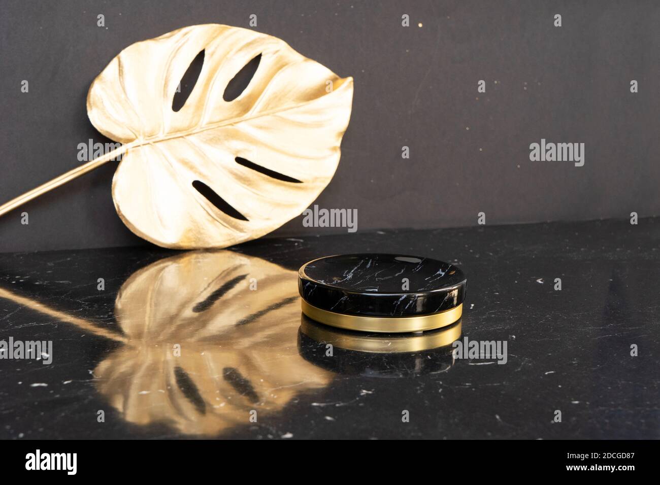black and gold product display Stock Photo - Alamy
