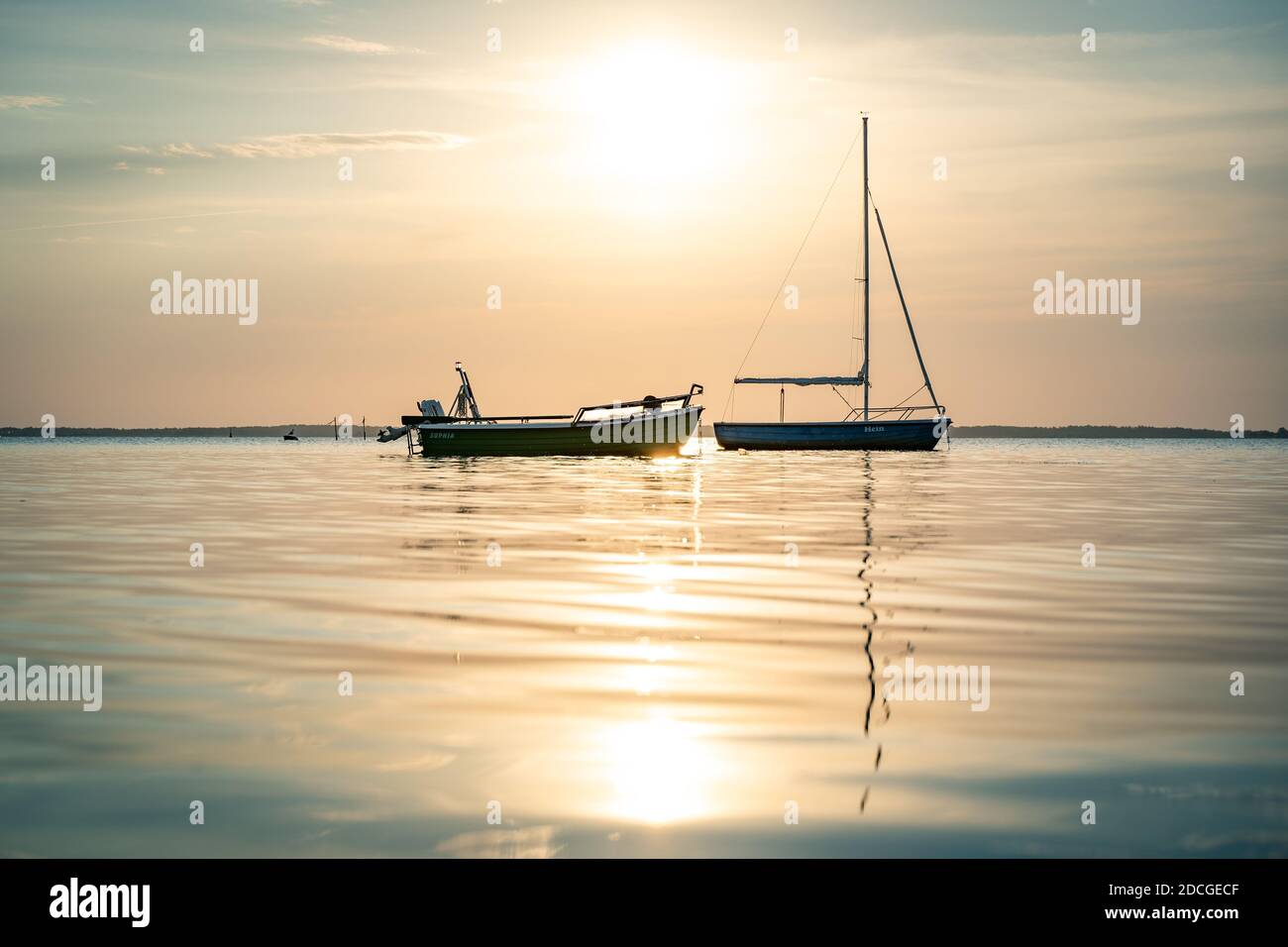 boats floating on the sea Stock Photo - Alamy