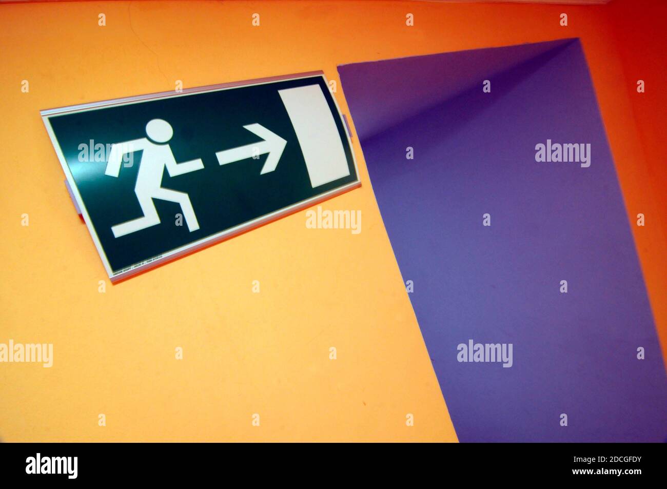 emergency exit sign in a building, symbol for running away Stock Photo ...