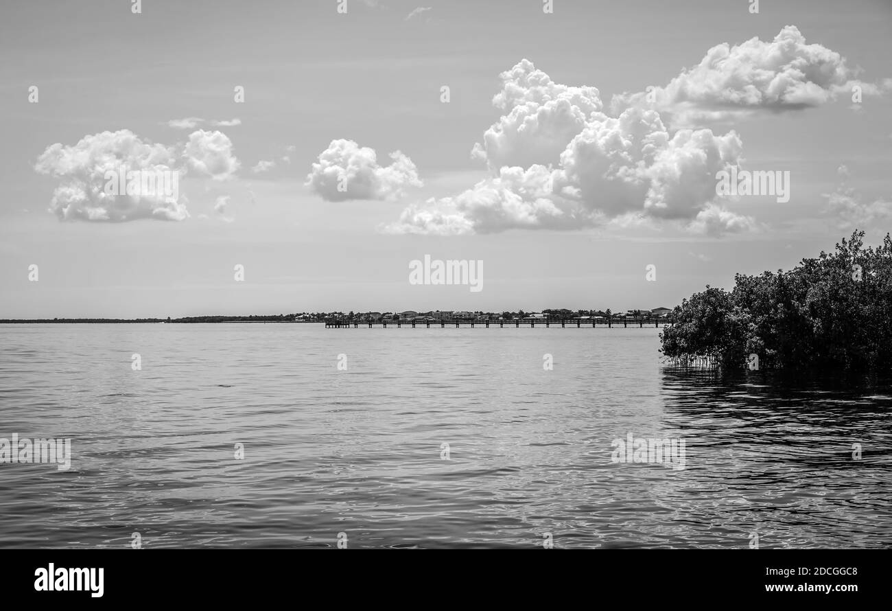 The fishing piers on Charlotte Harbor in southwest Florida in black and ...