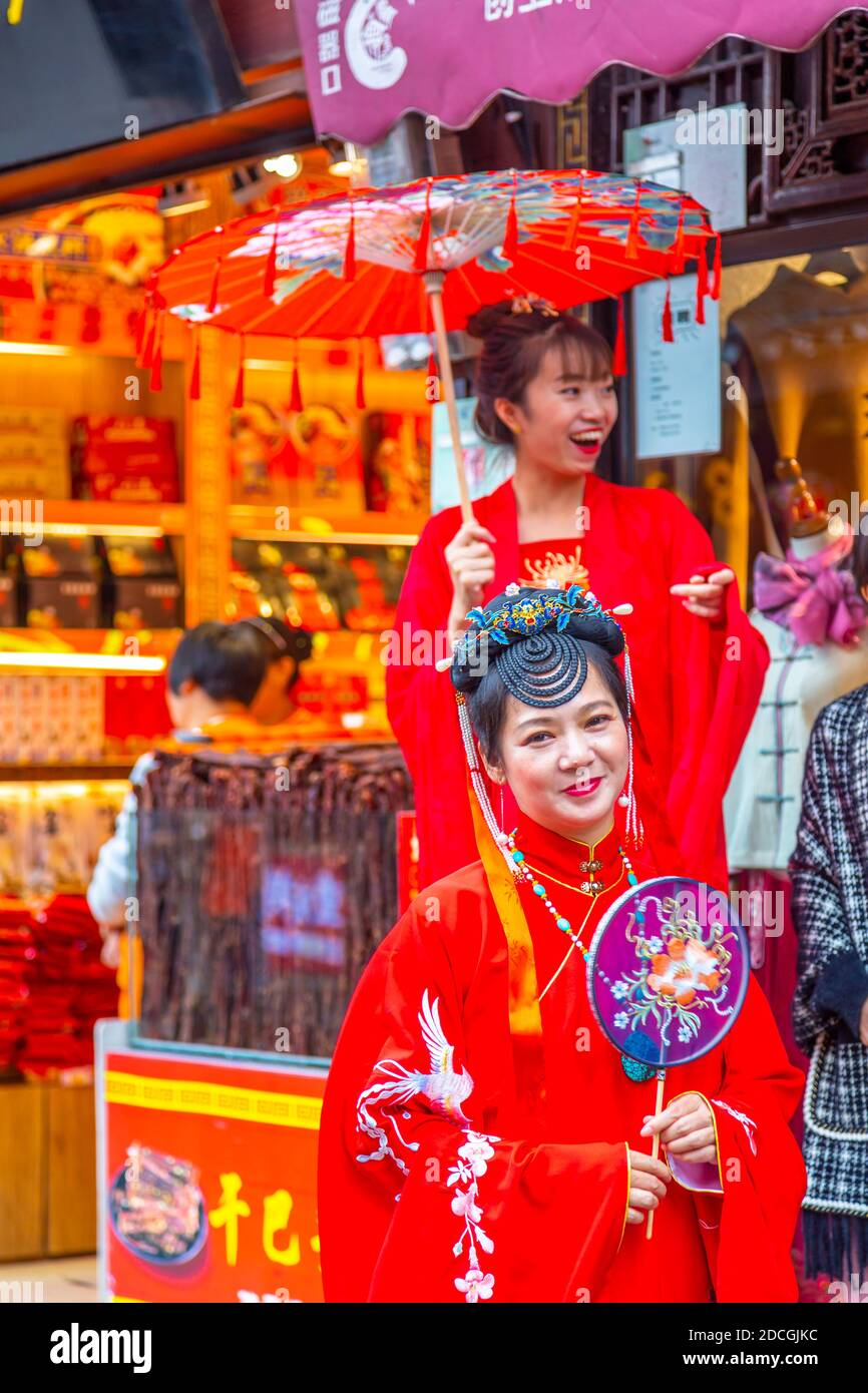 Chinese ladies in traditional dress in Ciqikou Old Town, Shapingba ...