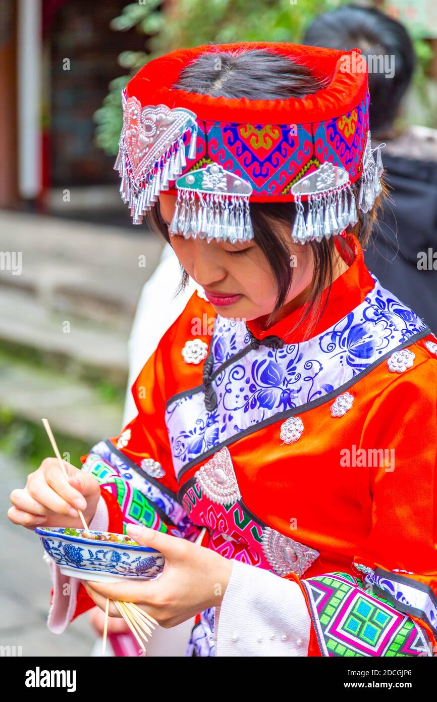 Chinese girl in traditional dress in Ciqikou Old Town, Shapingba ...