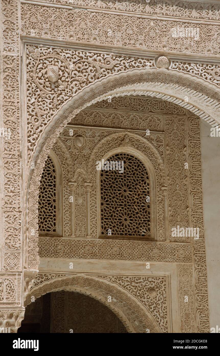 Column and arch decorated with Arabesque pattern in the Alhambra ...