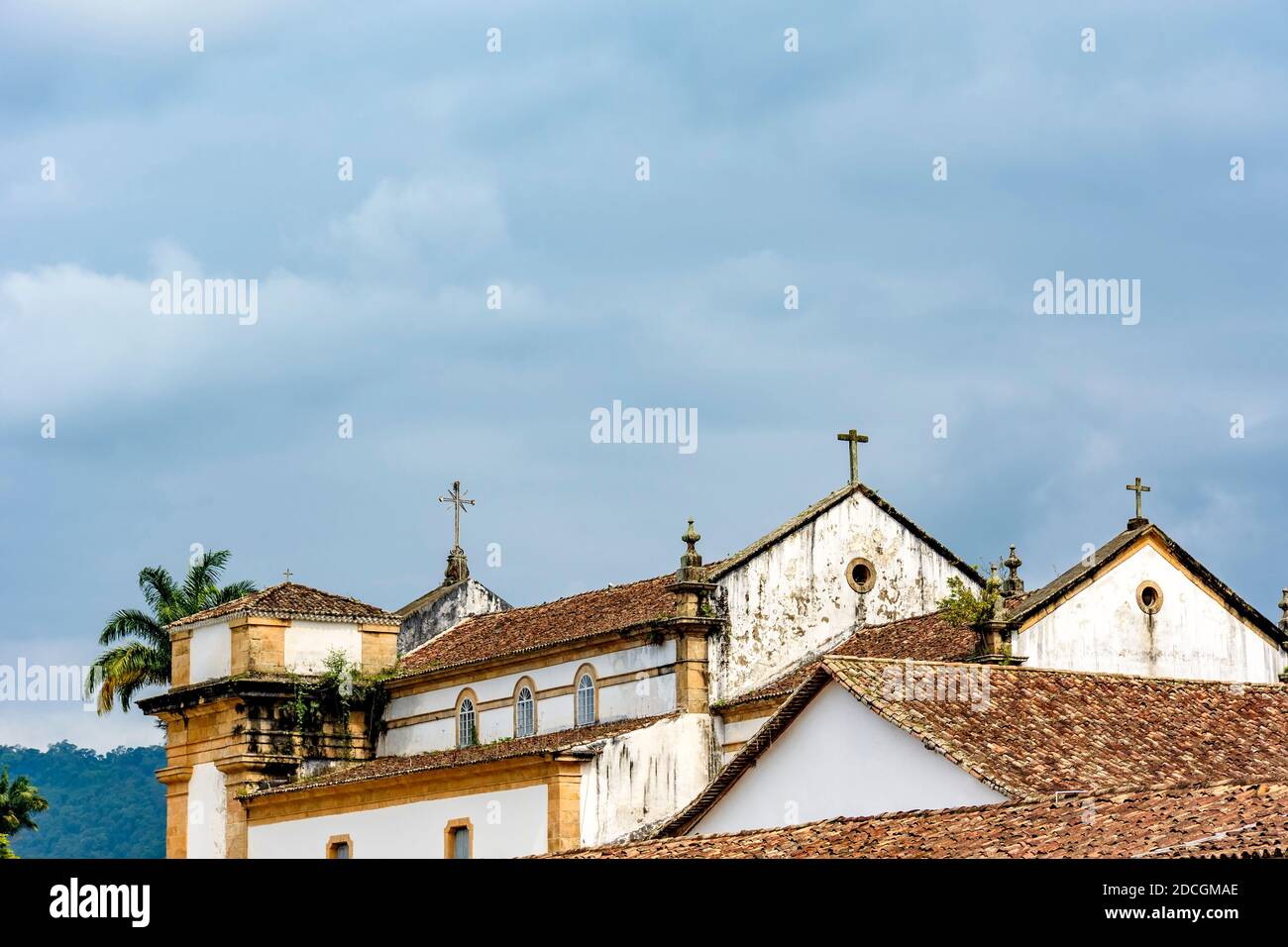 Back view of old colonial style church and roofs in the historic center ...