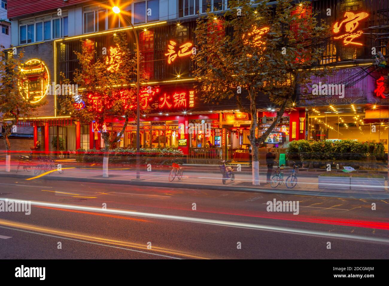 Restaurants and trail lights at night in Chengdu, Sichuan Province ...