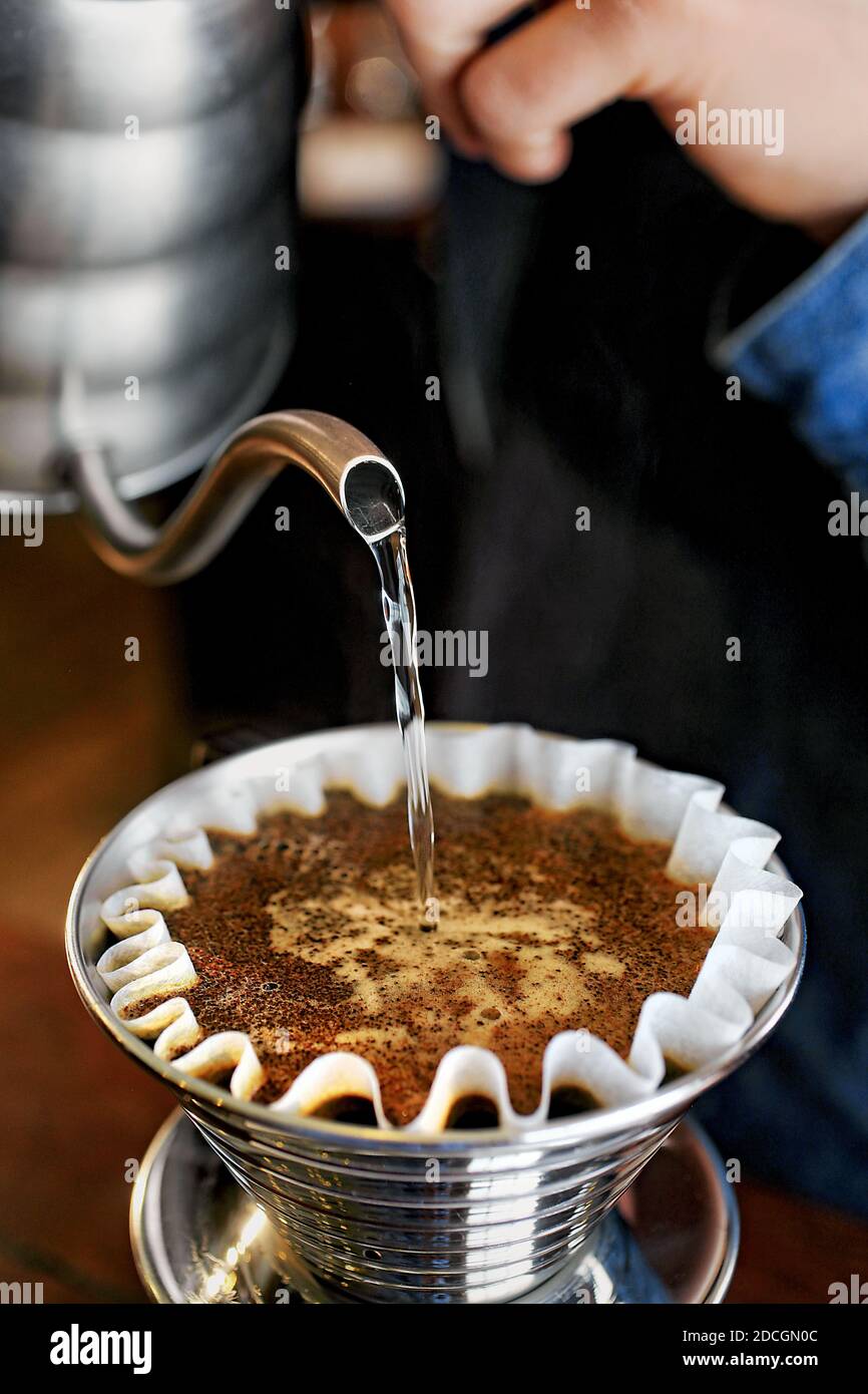 Drip brewing filtered coffee Stock Photo - Alamy