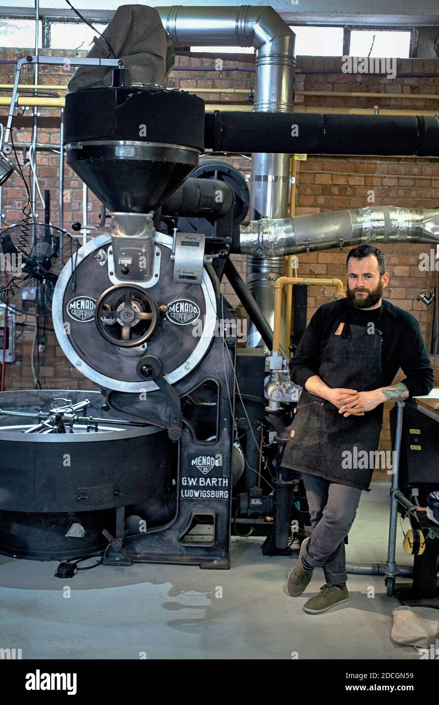 Great Britain / England / London /Portrait of man standing by coffee ...