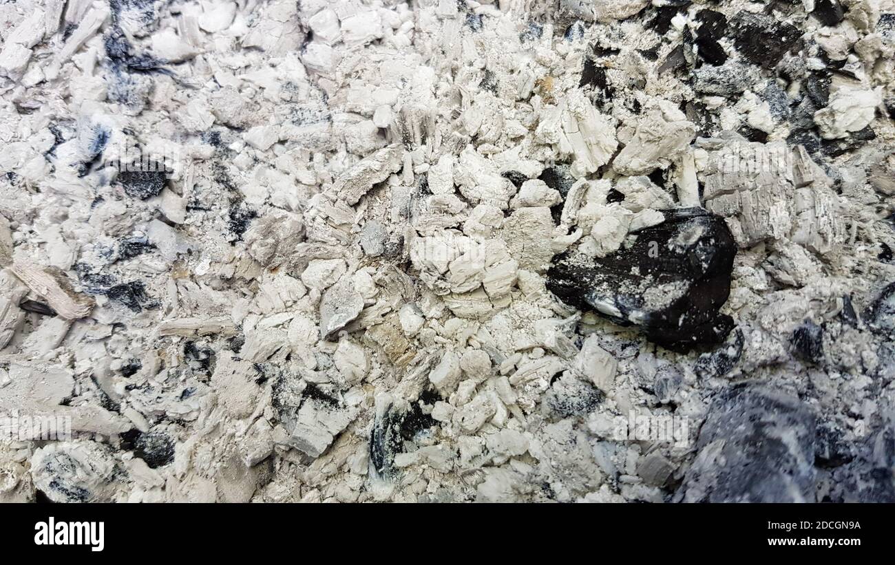 Bottom of fireplace closeup. Coal textures in gray tones. Picnic ...