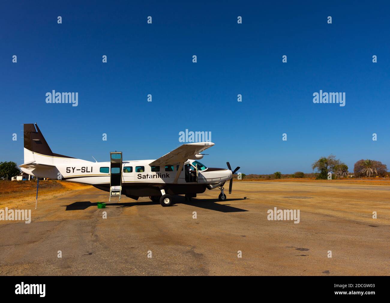 Safarilink plane on the airport runway, Lamu County, Manda island ...